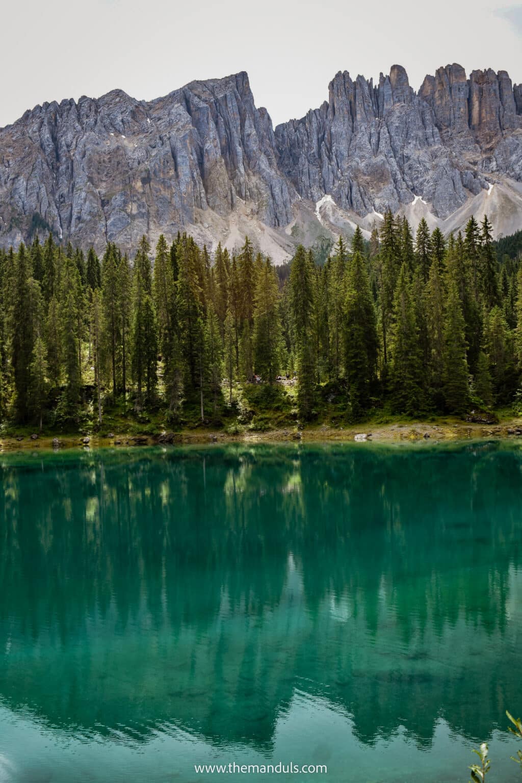 Visiting Lago di Carezza - Magical Rainbow Lake in Dolomites